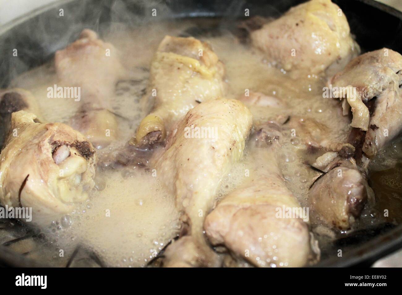 Pieces chicken cooked in smoke hi-res stock photography and images - Alamy