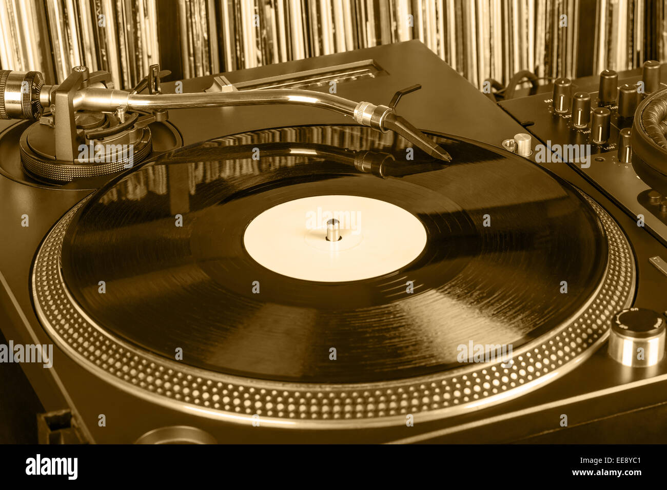 Dj needle stylus on spinning record, vinyl background Stock Photo - Alamy