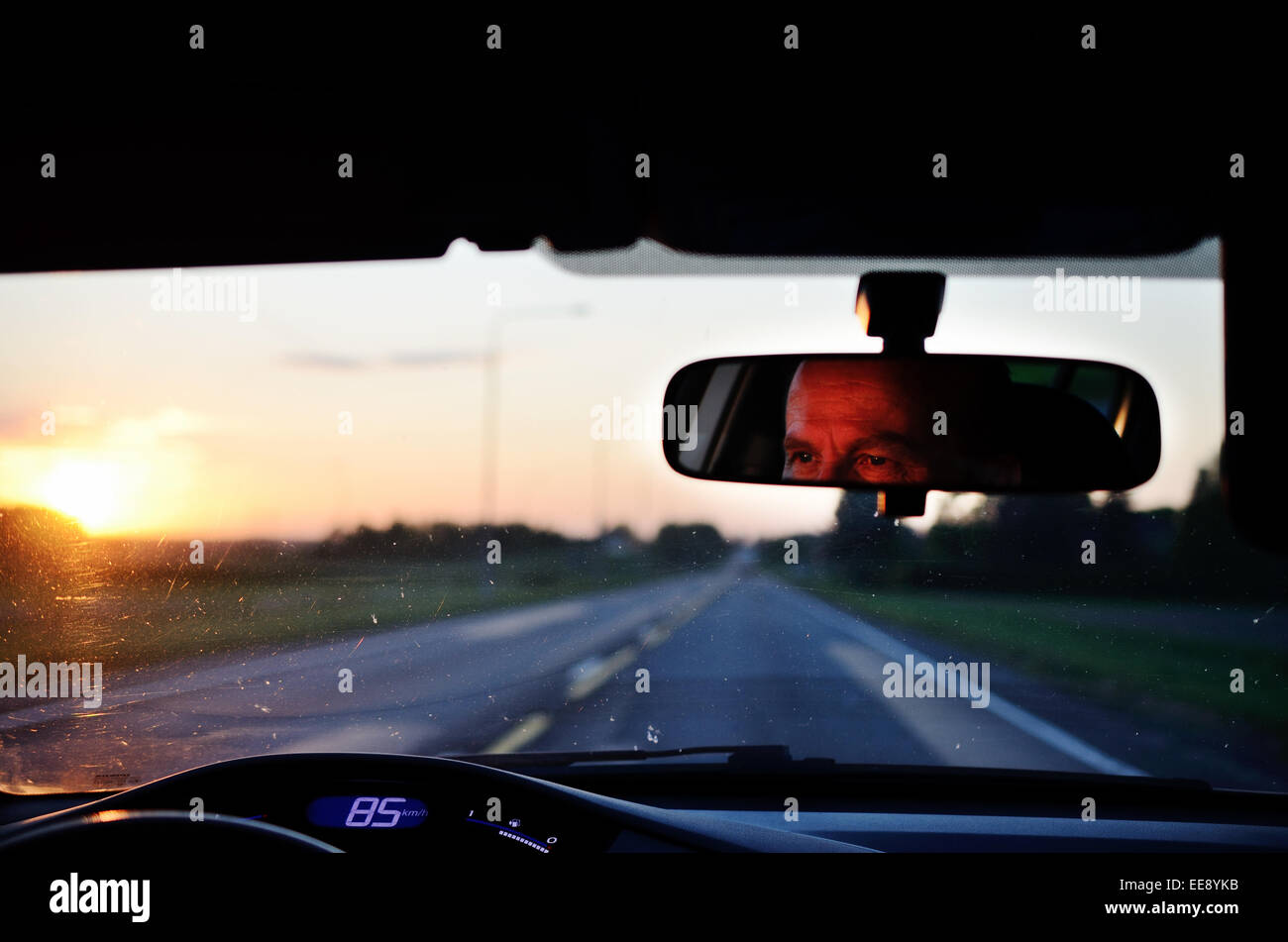reflected in the mirror of a car driver Stock Photo - Alamy
