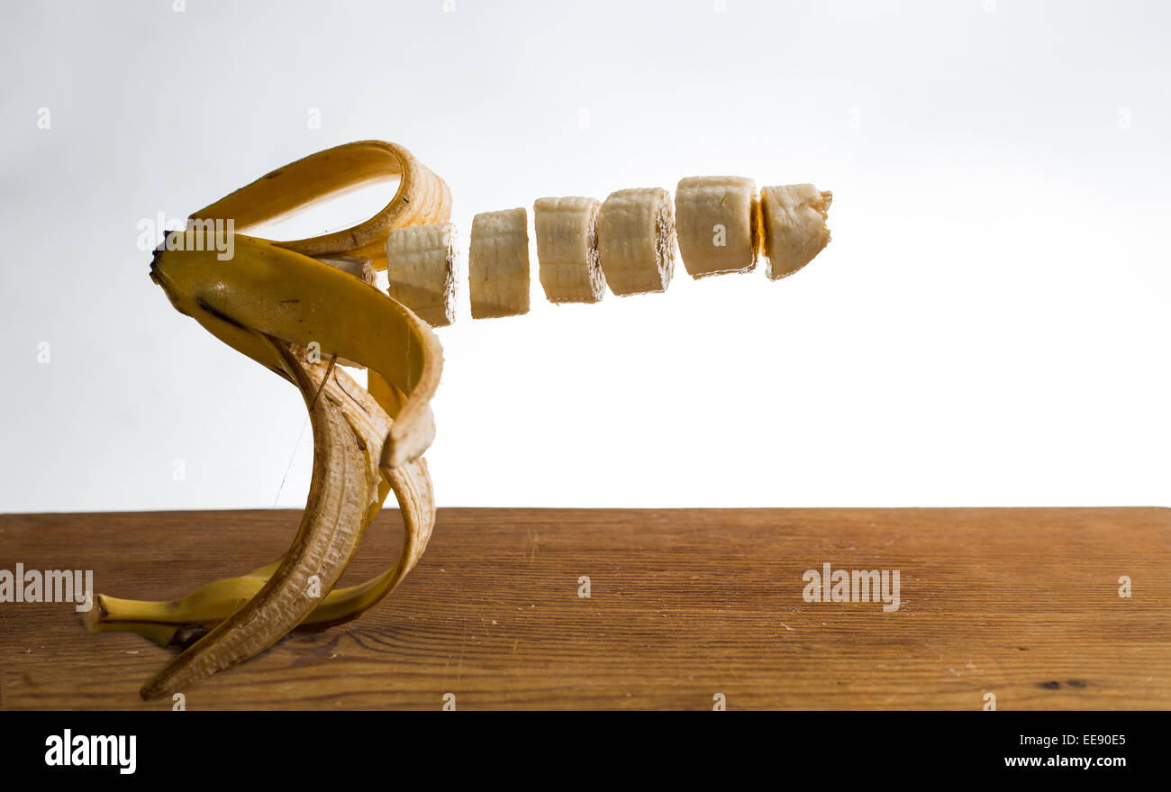 Banana flying floating levitation as pieces of slices flying Stock ...