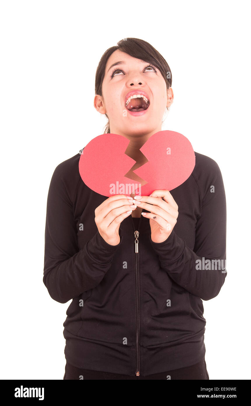 beautiful sad young girl holding a broken red heart concept of ...