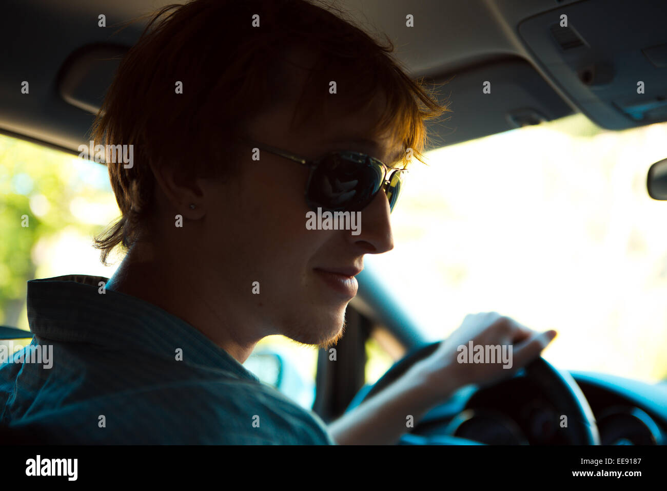 Man driving his car Stock Photo - Alamy