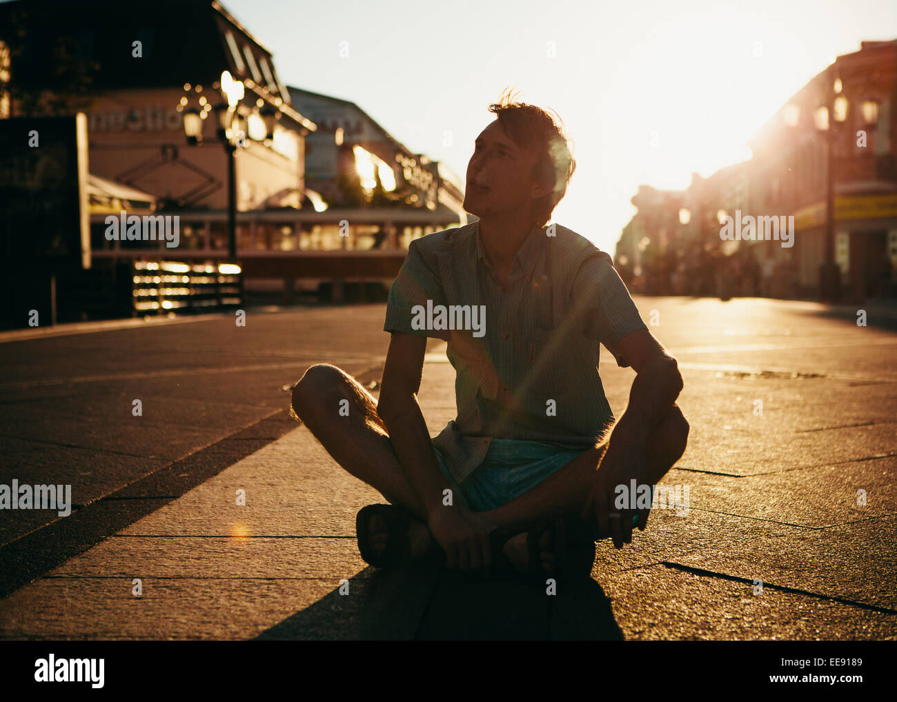 Young attractive man in urban background Stock Photo - Alamy