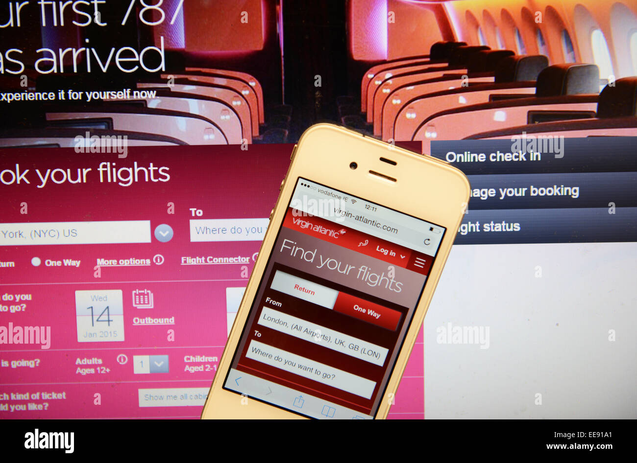 Virgin Atlantic Website with Iphone Stock Photo - Alamy
