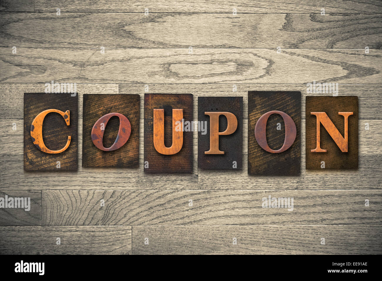 The word "COUPON" written in wooden letterpress type Stock Photo - Alamy