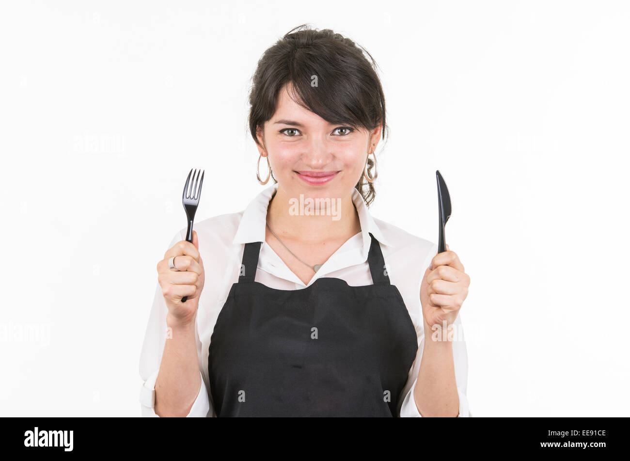 young beautiful female chef wearing black apron Stock Photo - Alamy
