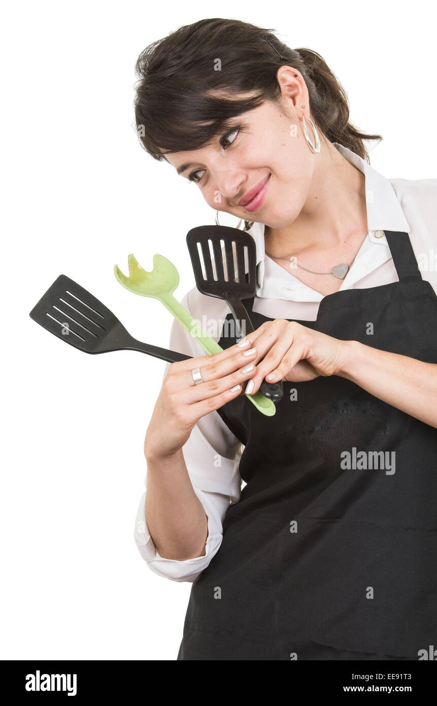 young beautiful female chef wearing black apron Stock Photo - Alamy