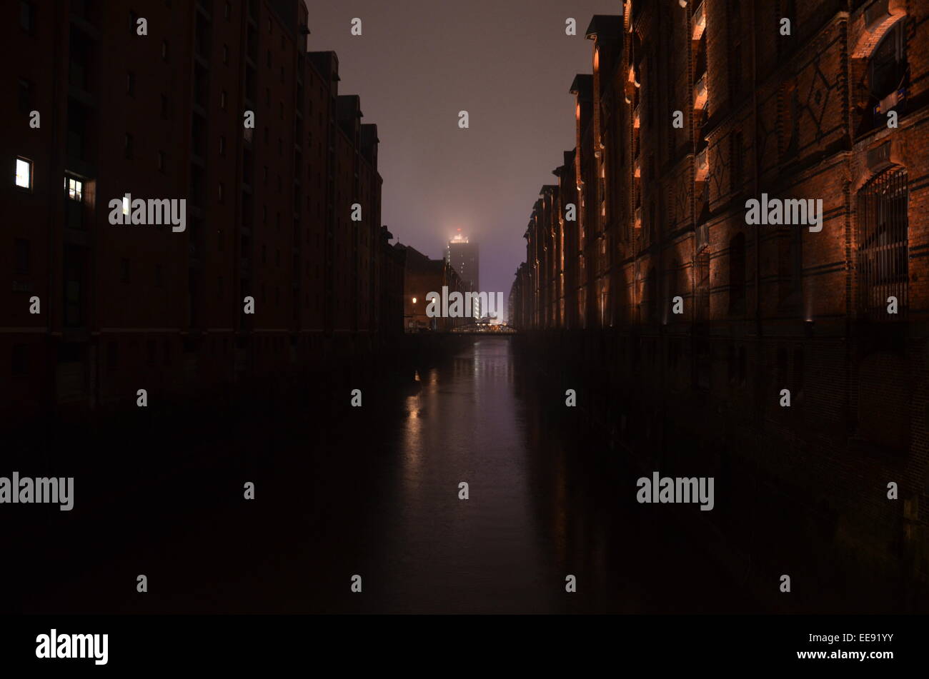 dark channel surrounded by buildings Stock Photo - Alamy