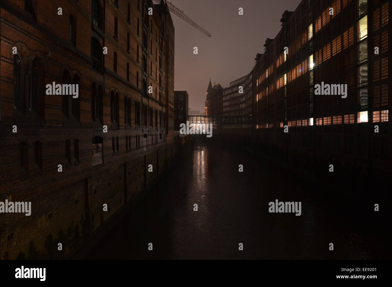 dark channel surrounded by buildings Stock Photo - Alamy