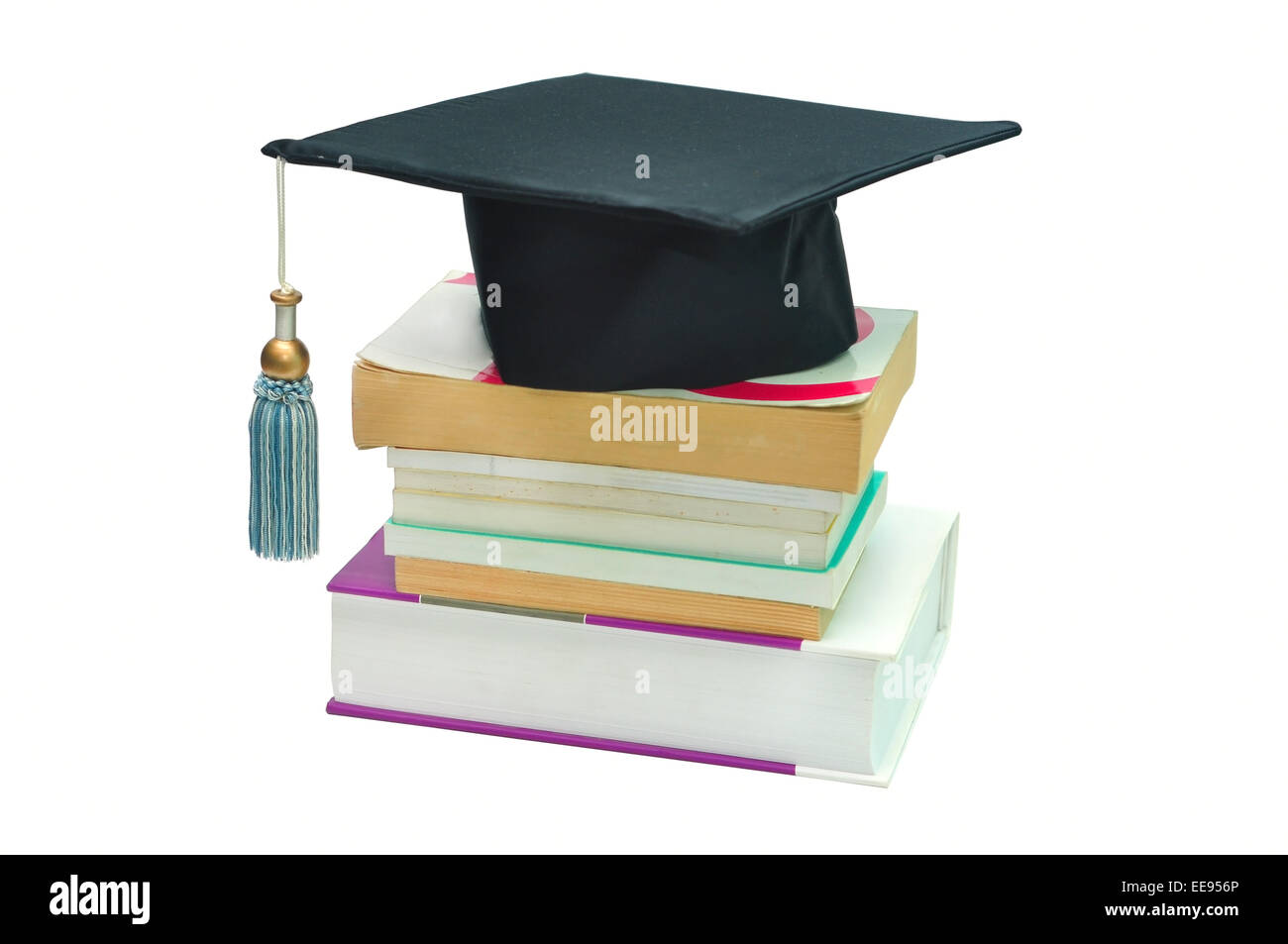 Graduation cap on top of a stack of books isolated on white Stock Photo ...