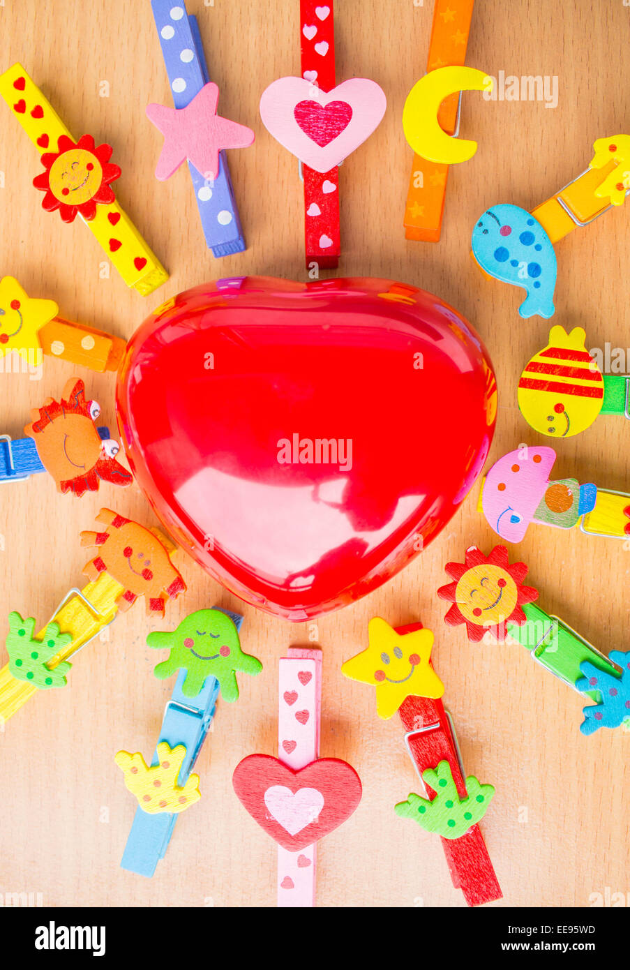 Red heart in the center pin Stock Photo - Alamy