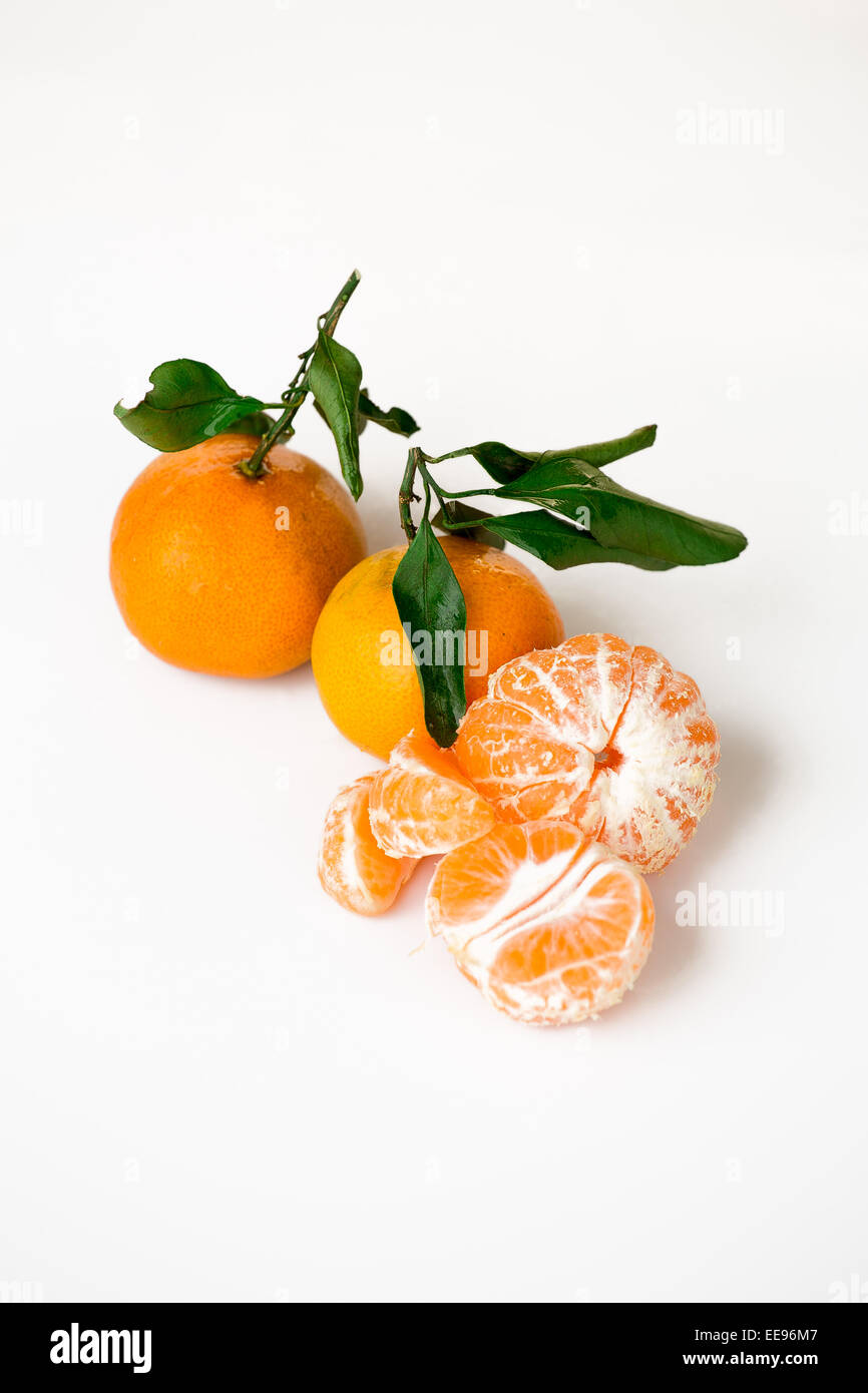 fresh mandarin with leaf isolated on white Stock Photo - Alamy