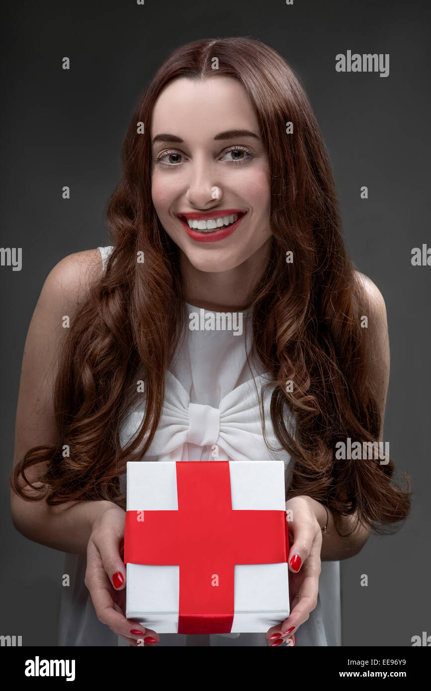 Woman with red cross Stock Photo - Alamy