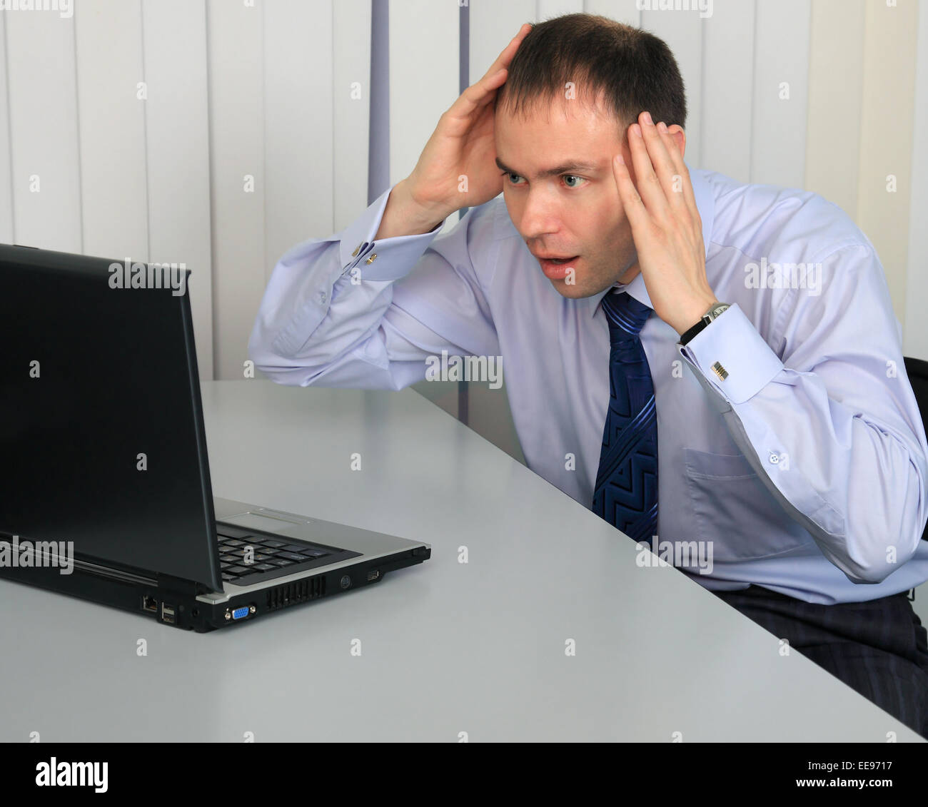 A businessman in horror Stock Photo - Alamy