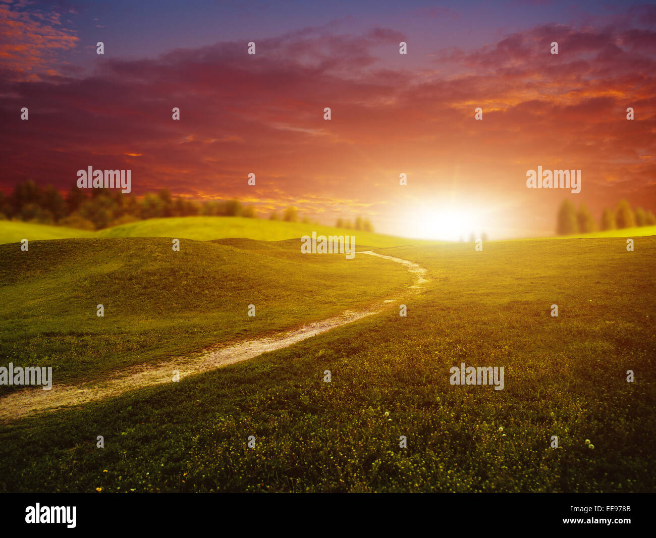 Fantastic sunset over summer green hills, abstract environmental ...