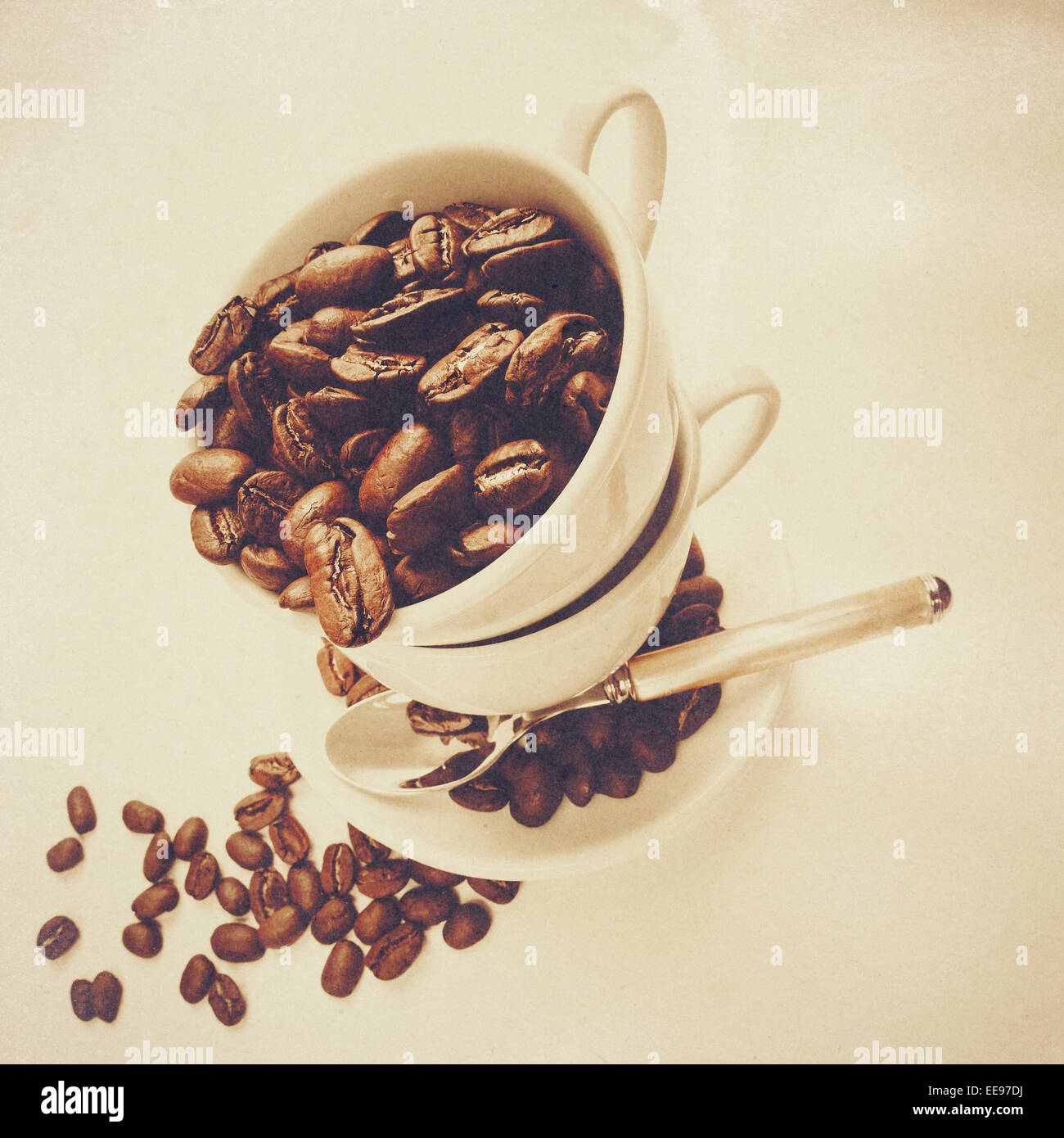Vintage coffee still life with old cardboard texture, few cup and spoon ...