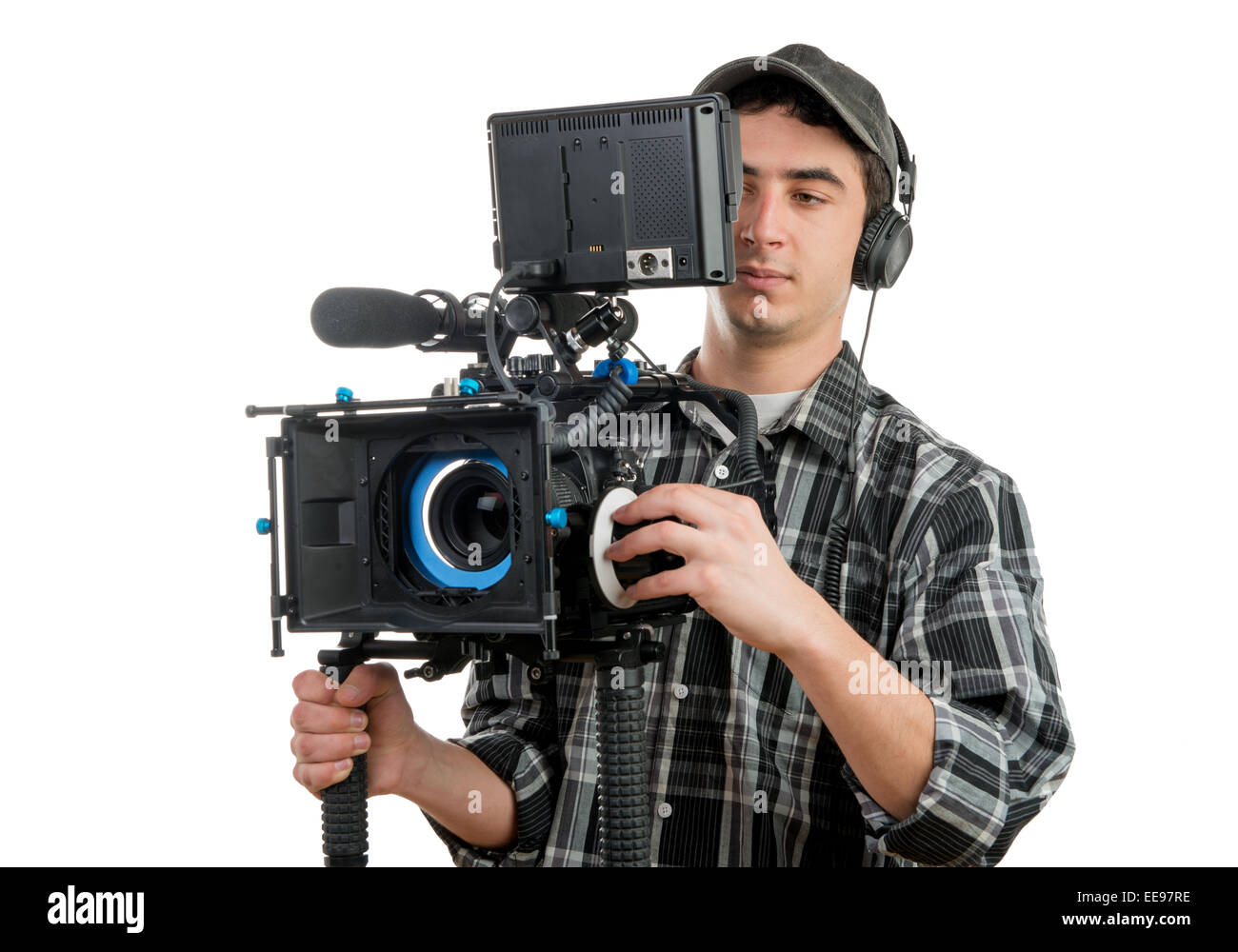 young cameraman with movie camera on the white background Stock Photo ...