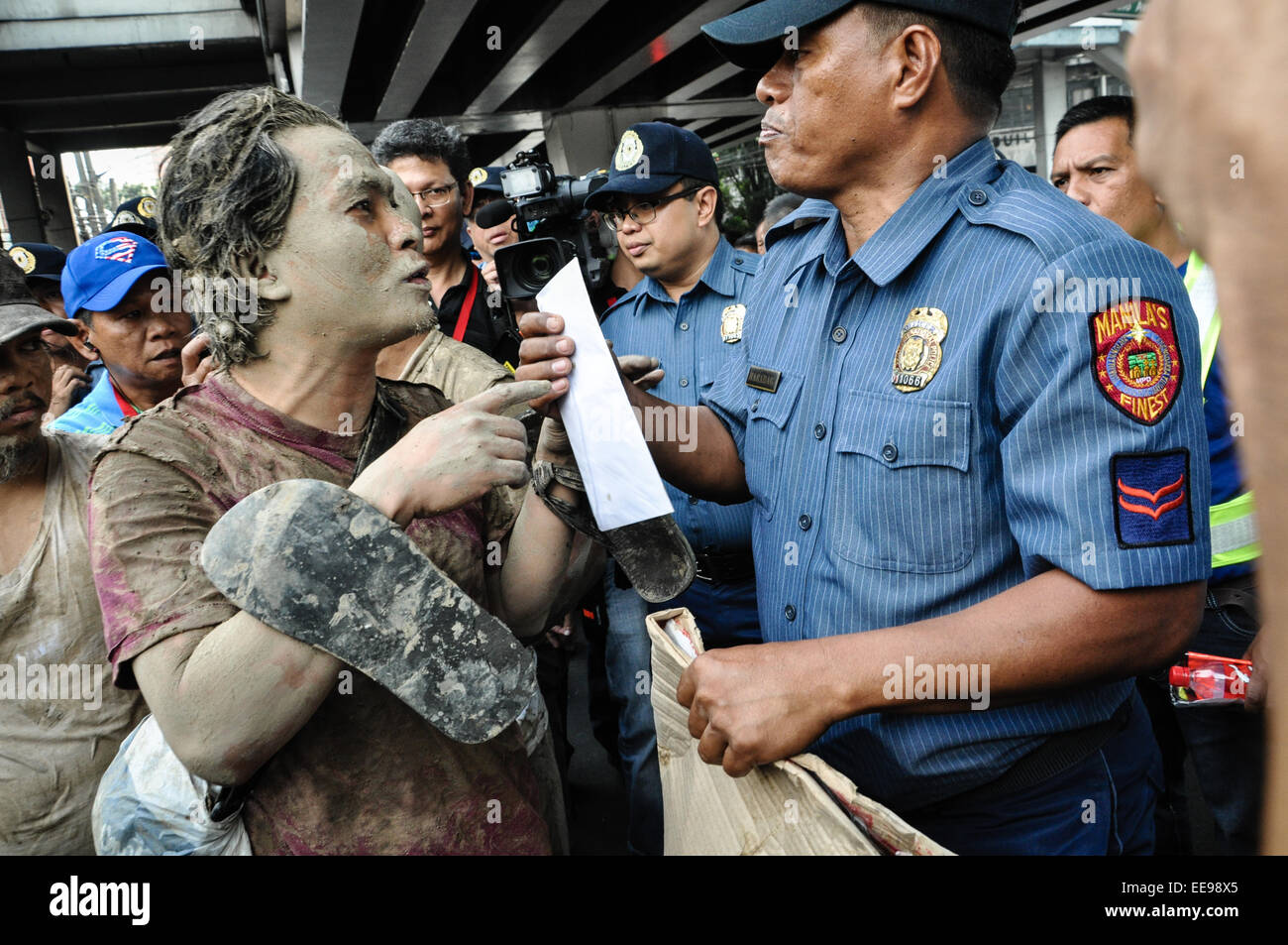 Performance artists hold 'Mud Walk' for Yolanda victims near the ...