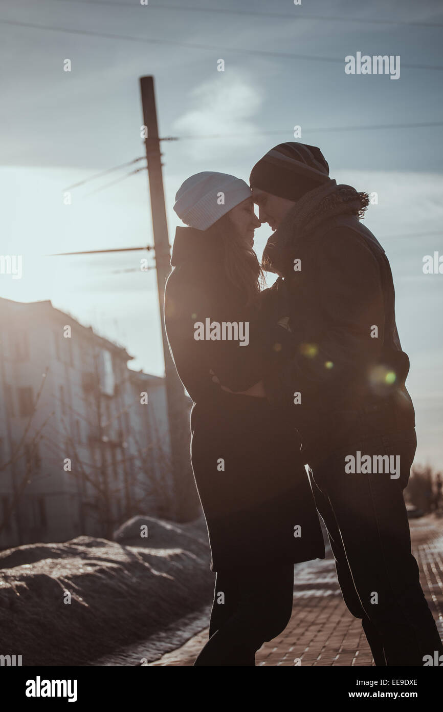 Profile view of an attractive couple Stock Photo - Alamy