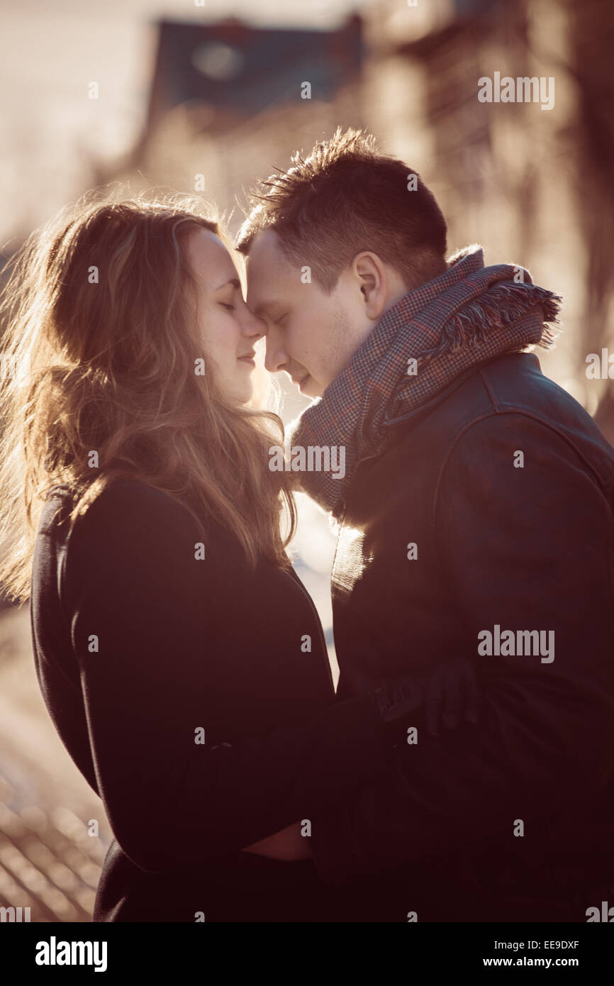 Profile view of an attractive couple Stock Photo - Alamy