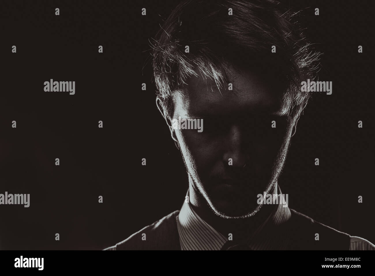 Dramatic portrait. Black background Stock Photo - Alamy