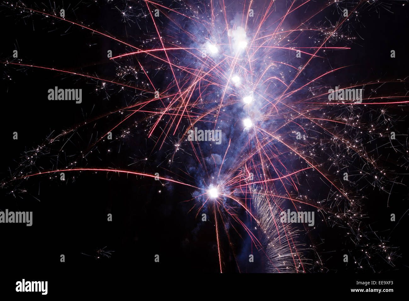 Fireworks explosions in the night sky Stock Photo - Alamy
