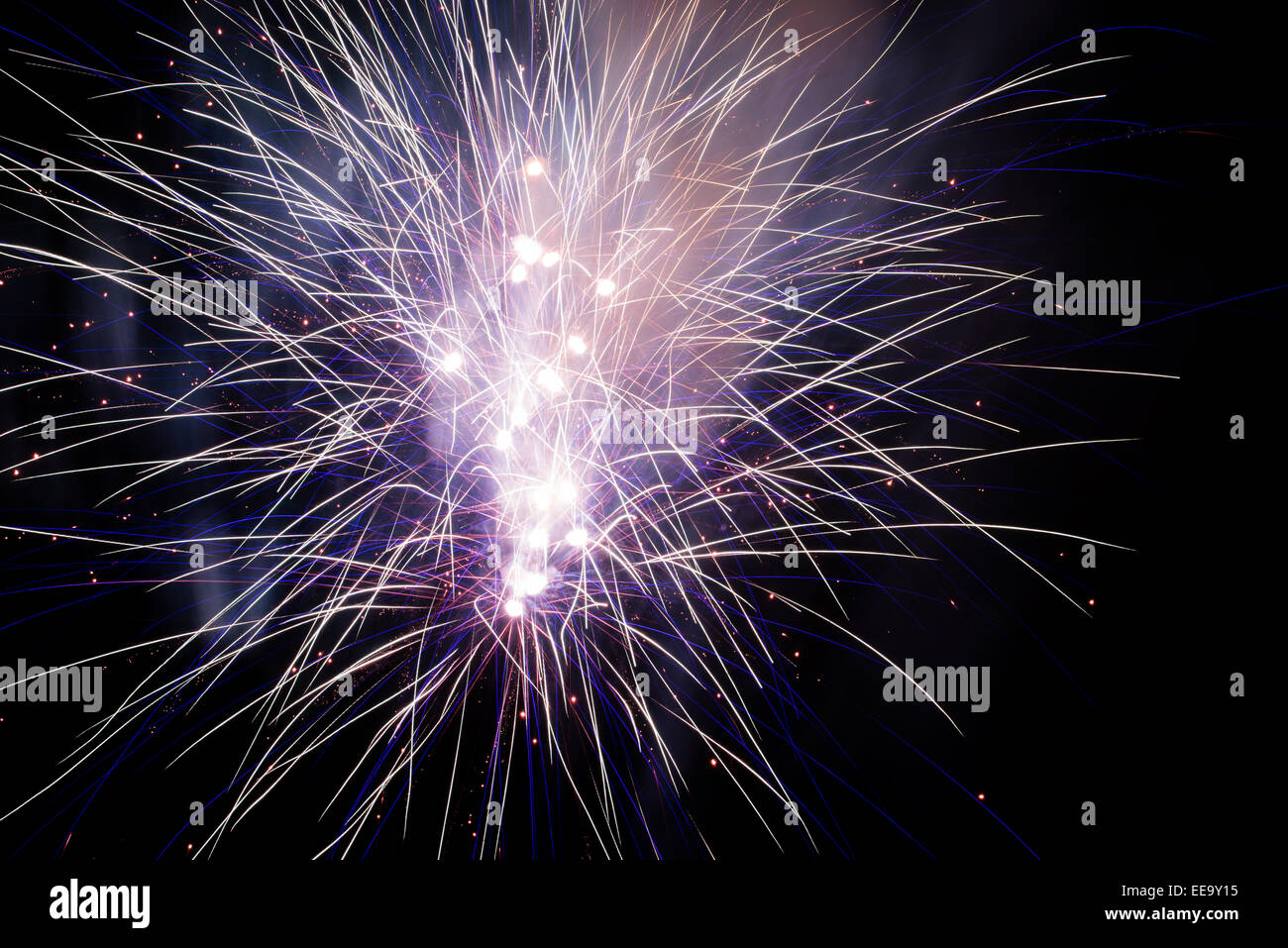 Fireworks explosions in the night sky Stock Photo - Alamy