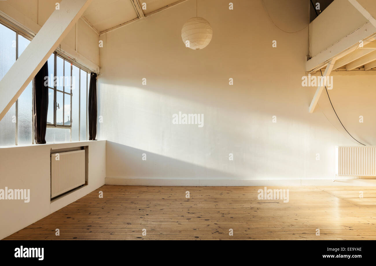 wide loft, beams and wooden floor Stock Photo - Alamy