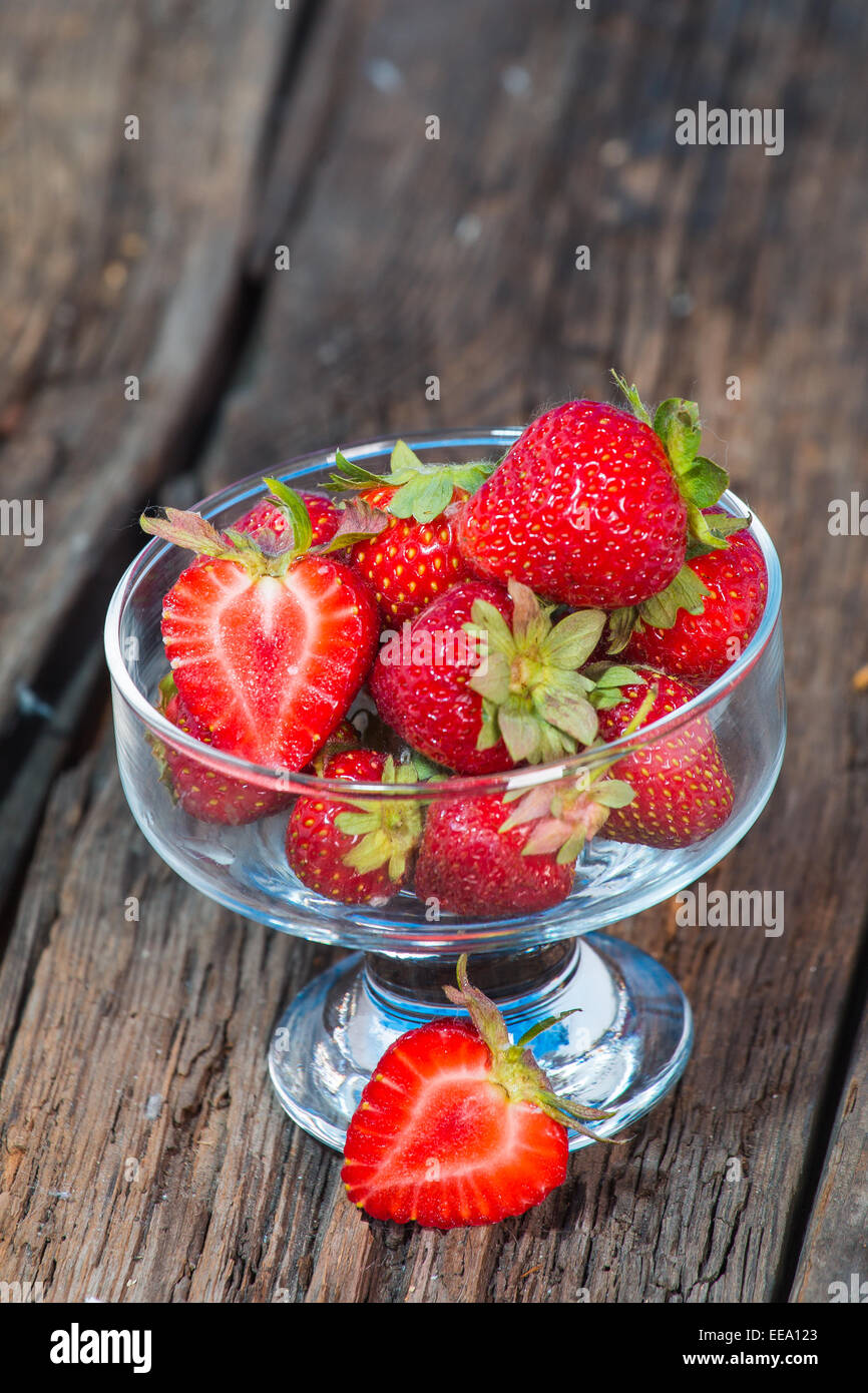 isolated strawberry isolated on rustic wooden background Stock Photo ...