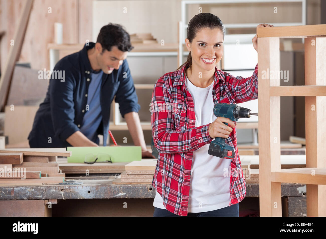 Woman happy with carpenter hi-res stock photography and images - Alamy