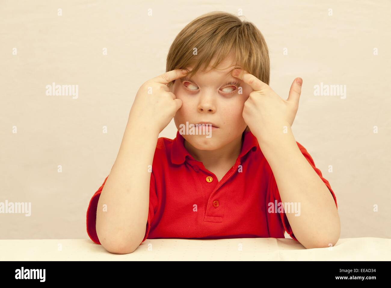 young boy making faces Stock Photo - Alamy