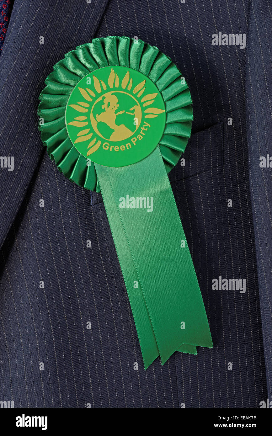Close up of a Green Party General Election 2015 rosette on a candidate ...
