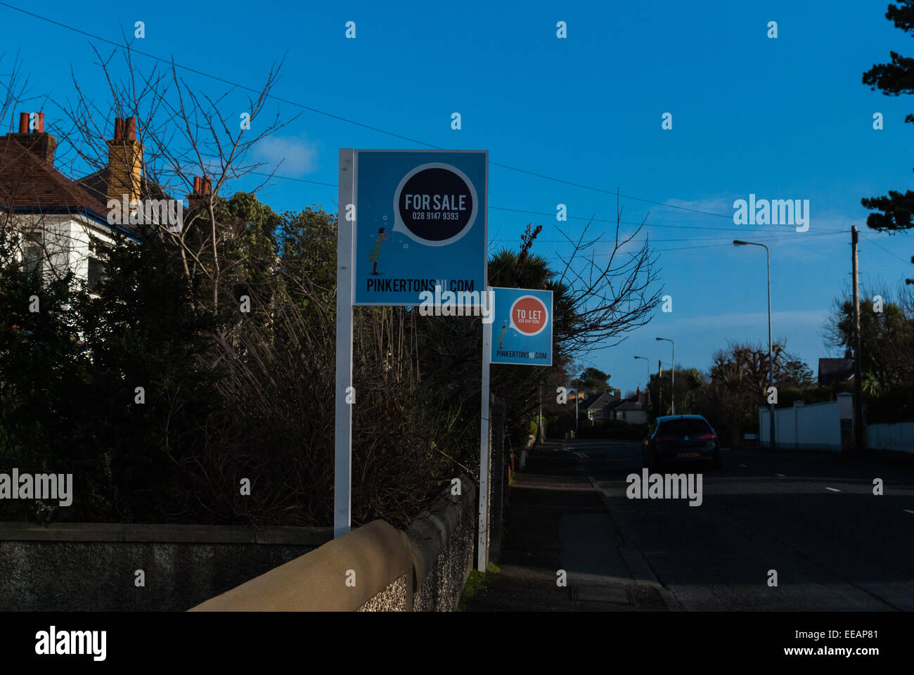 Estate Agents signs in a suburban street Stock Photo - Alamy