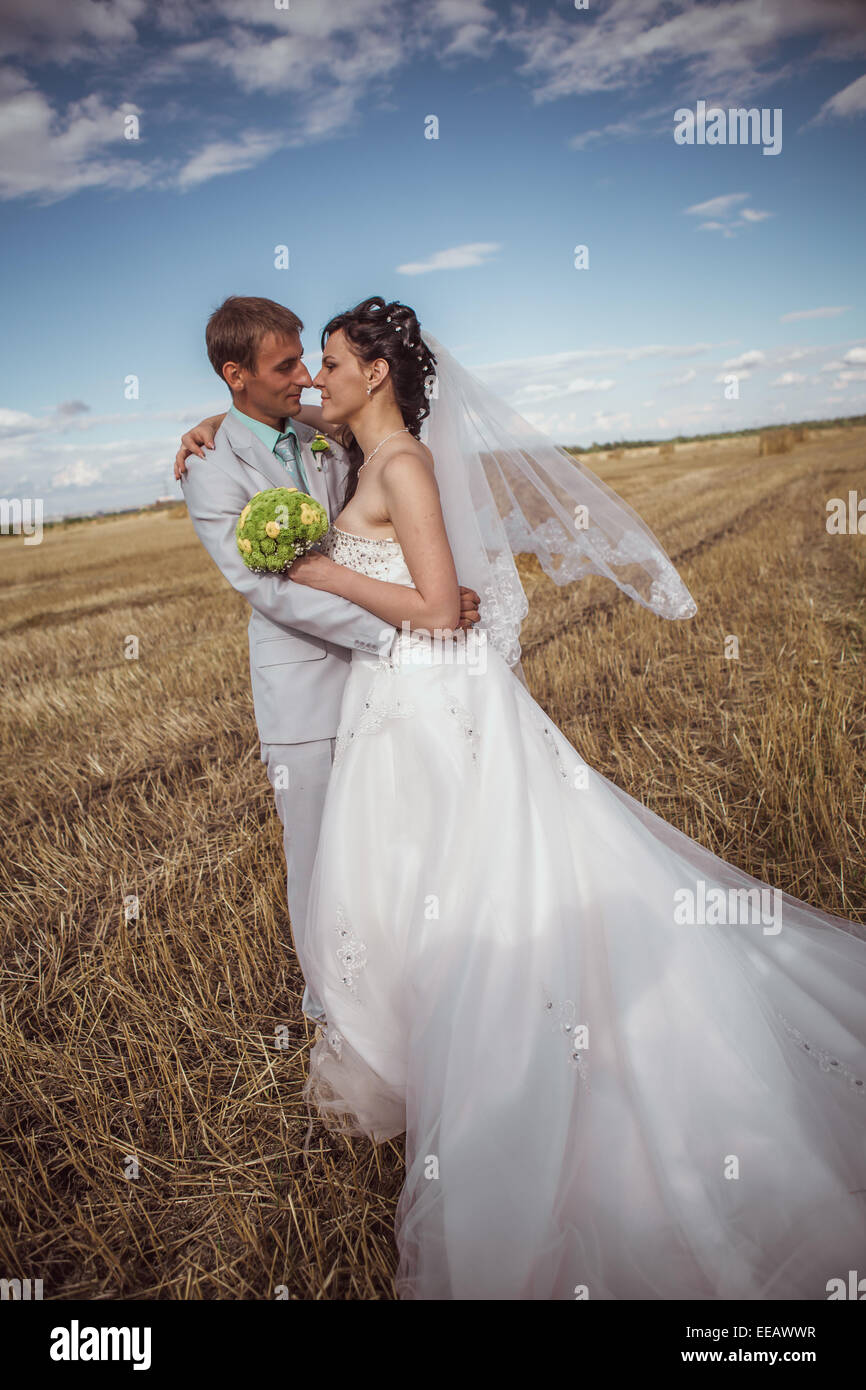 Beautiful bride and groom portrait in nature Stock Photo - Alamy