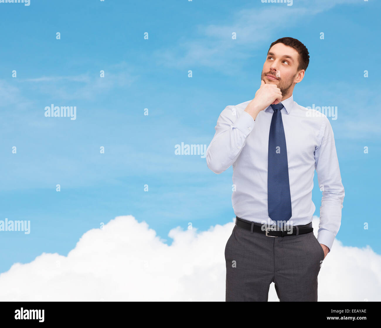 handsome businessman looking up Stock Photo - Alamy