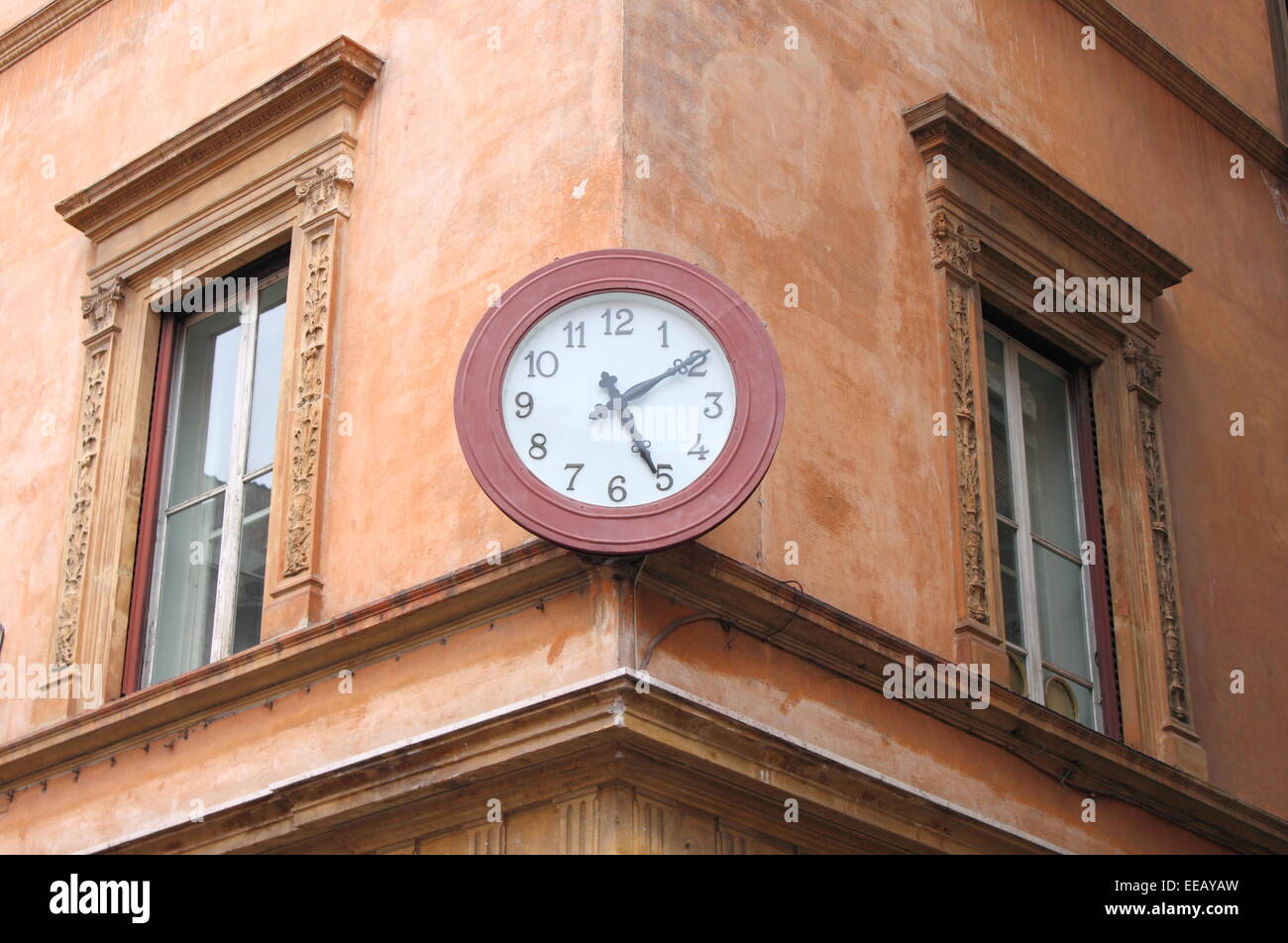 Ancient wall clock in a renaissance palace in Rome, Italy Stock Photo ...