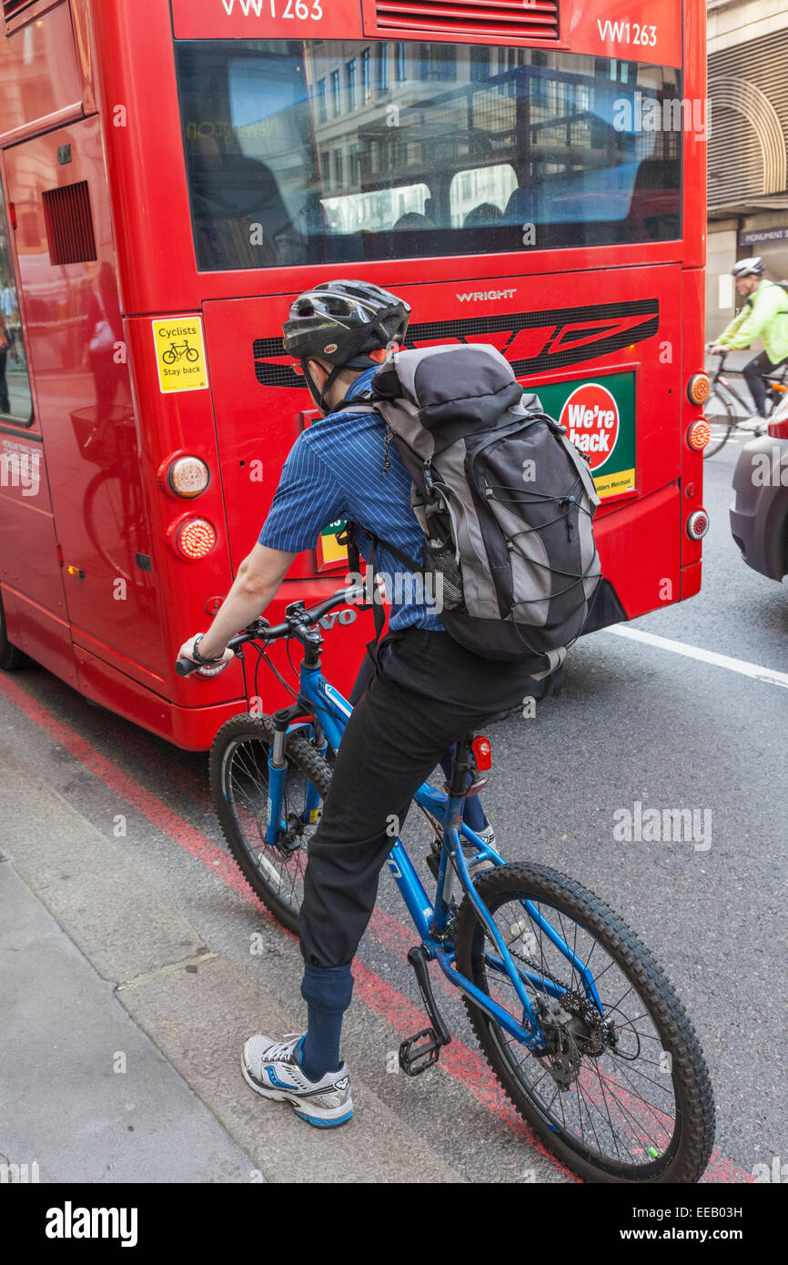 England, London, City of London, Cyclist and Bus Stock Photo - Alamy
