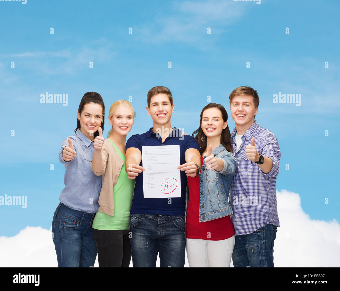 group of students showing test and thumbs up Stock Photo - Alamy