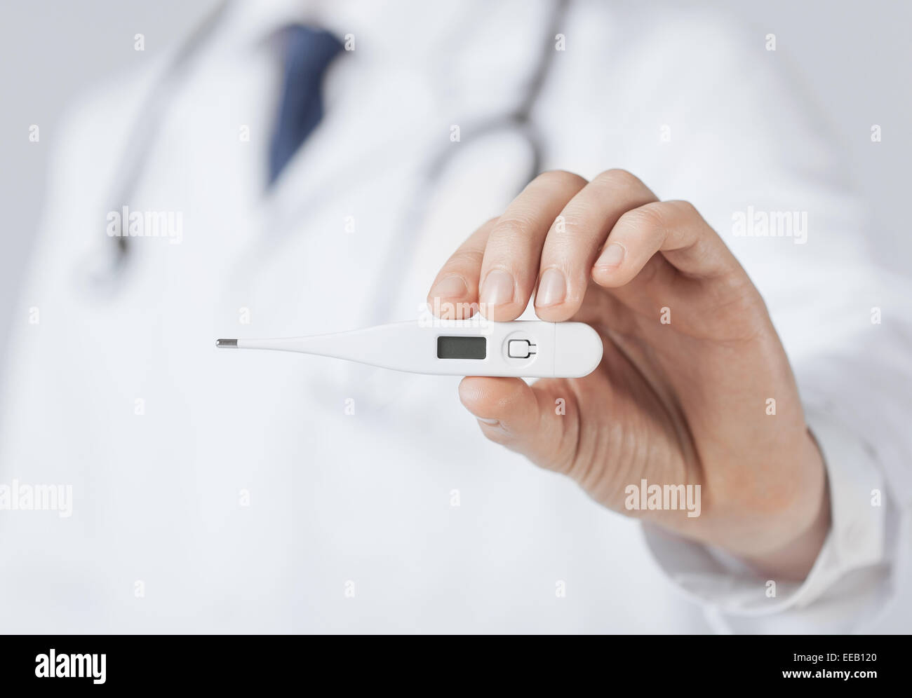 male doctor with thermometer Stock Photo - Alamy