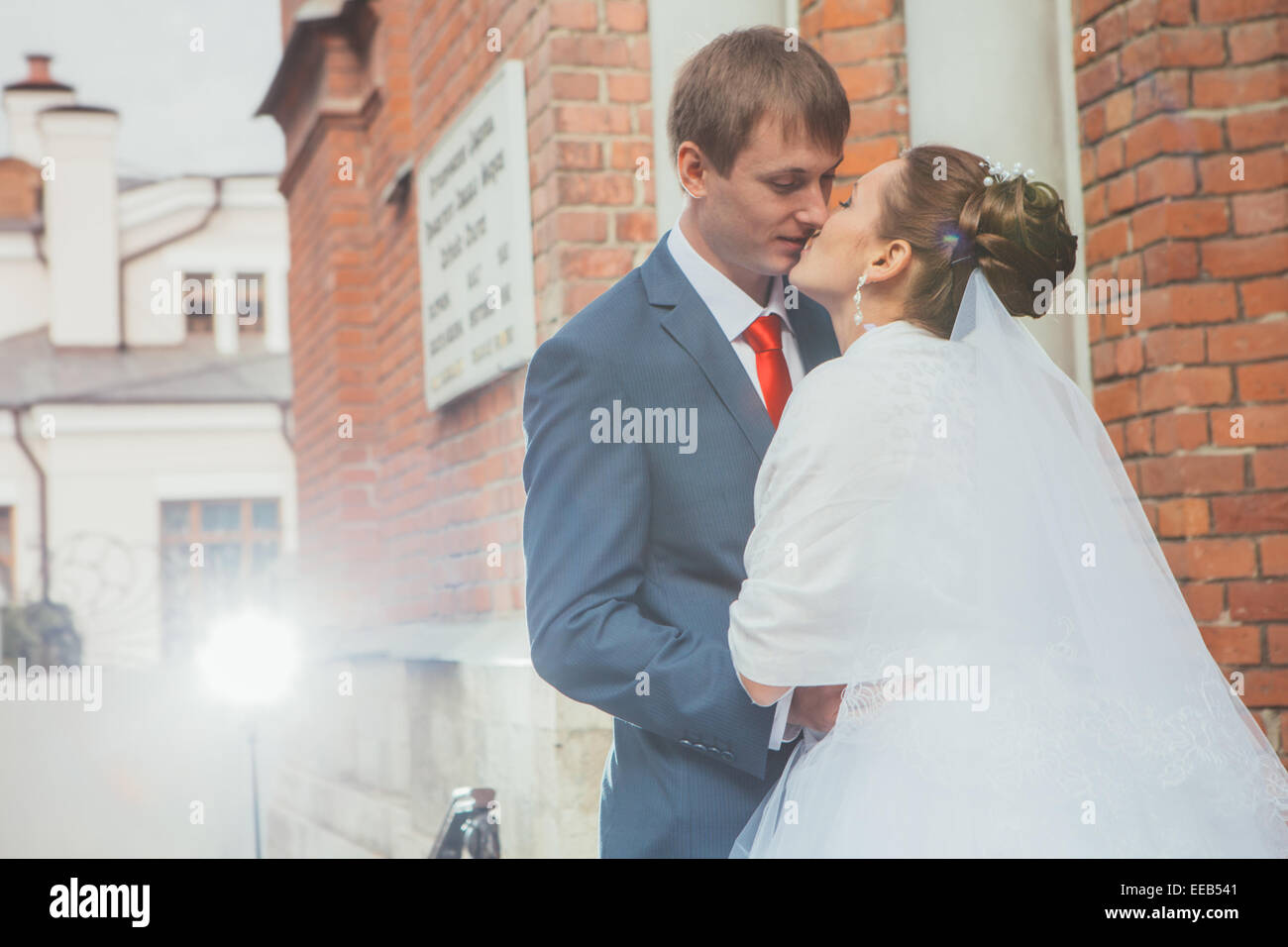 A beautiful bride and handsome groom at church during wedding Stock ...