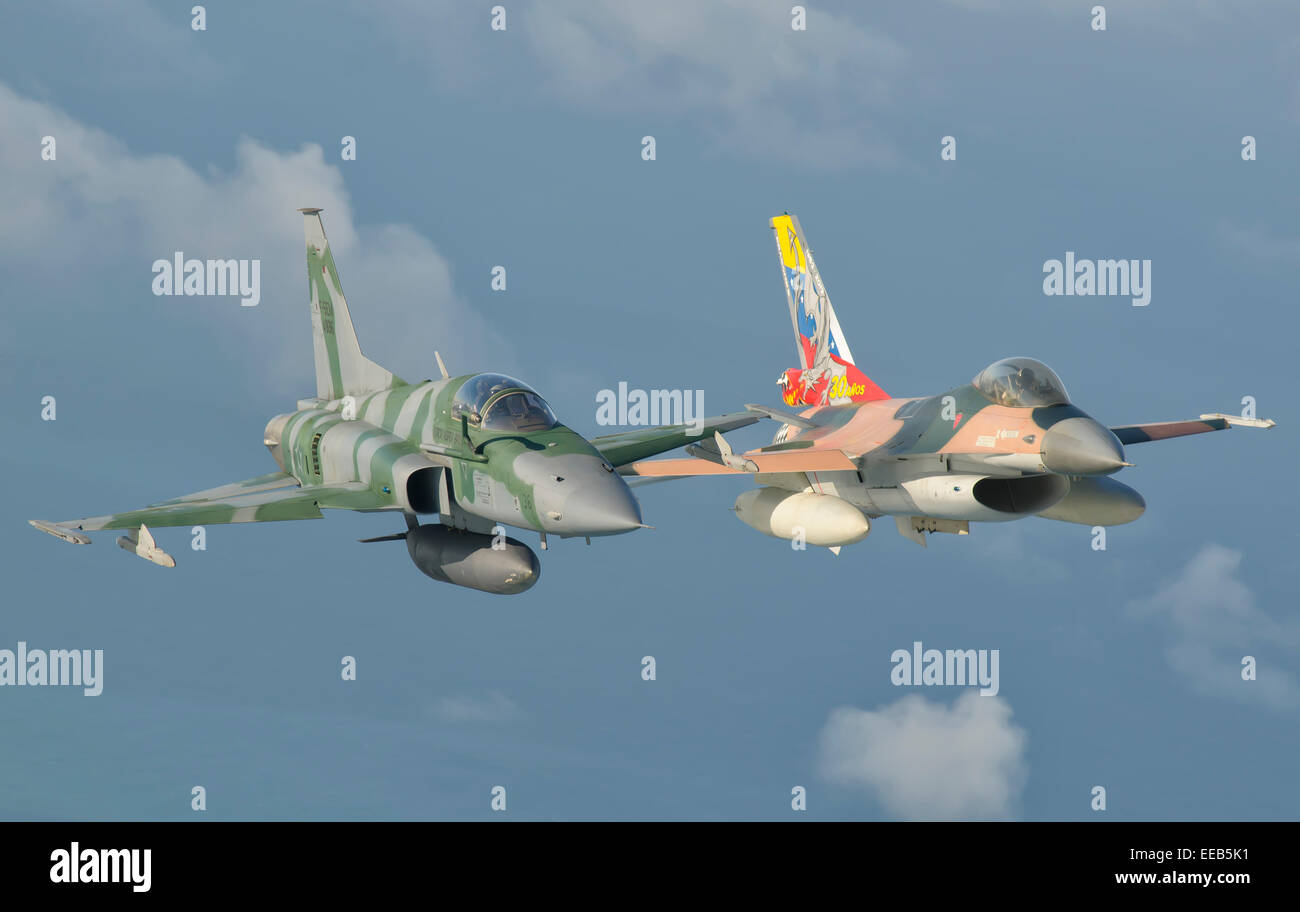 Venezuelan Air Force F-16 and Brazilian Air Force F-5 in flight over ...