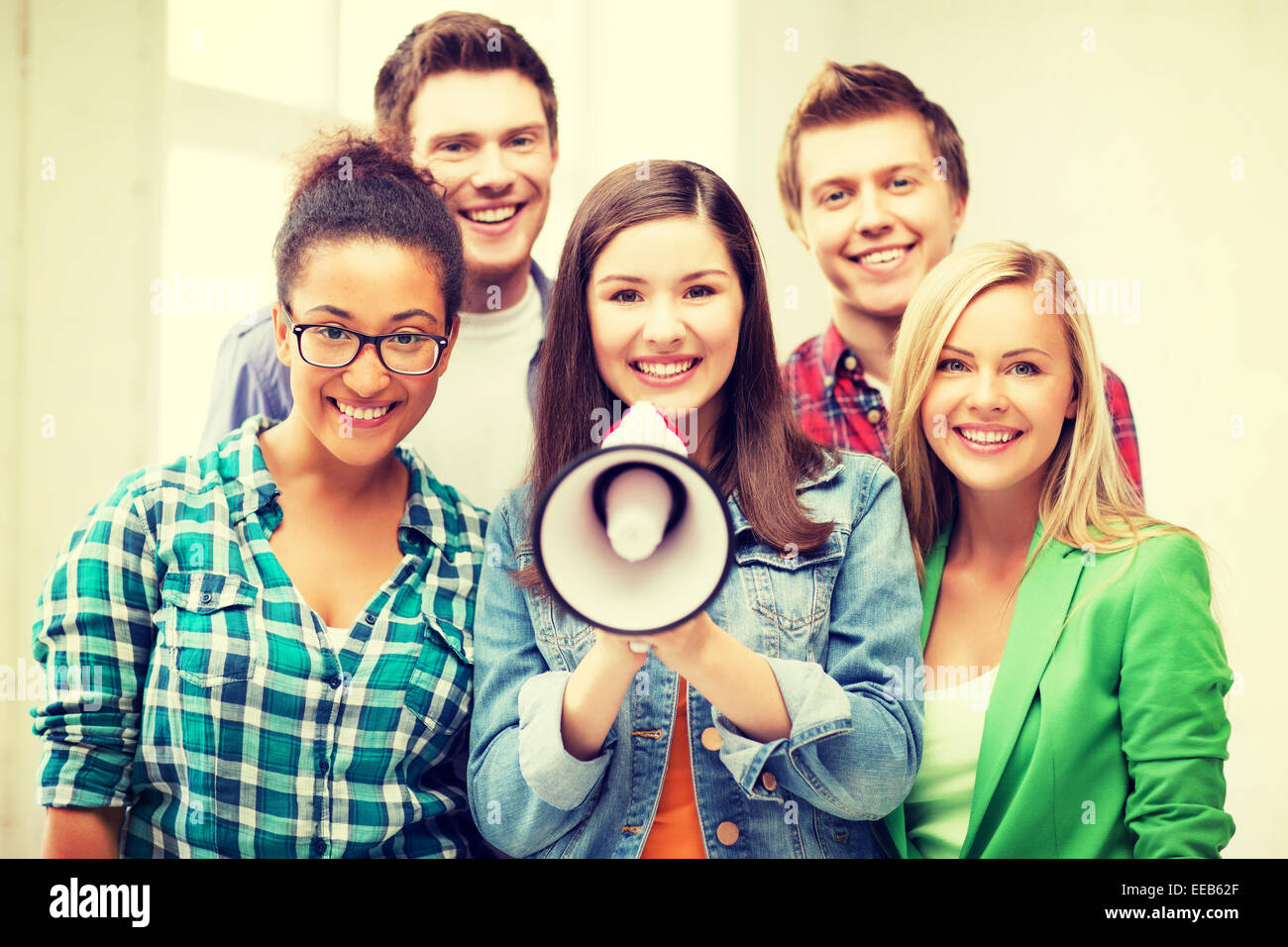 group of students with megaphone at school Stock Photo - Alamy