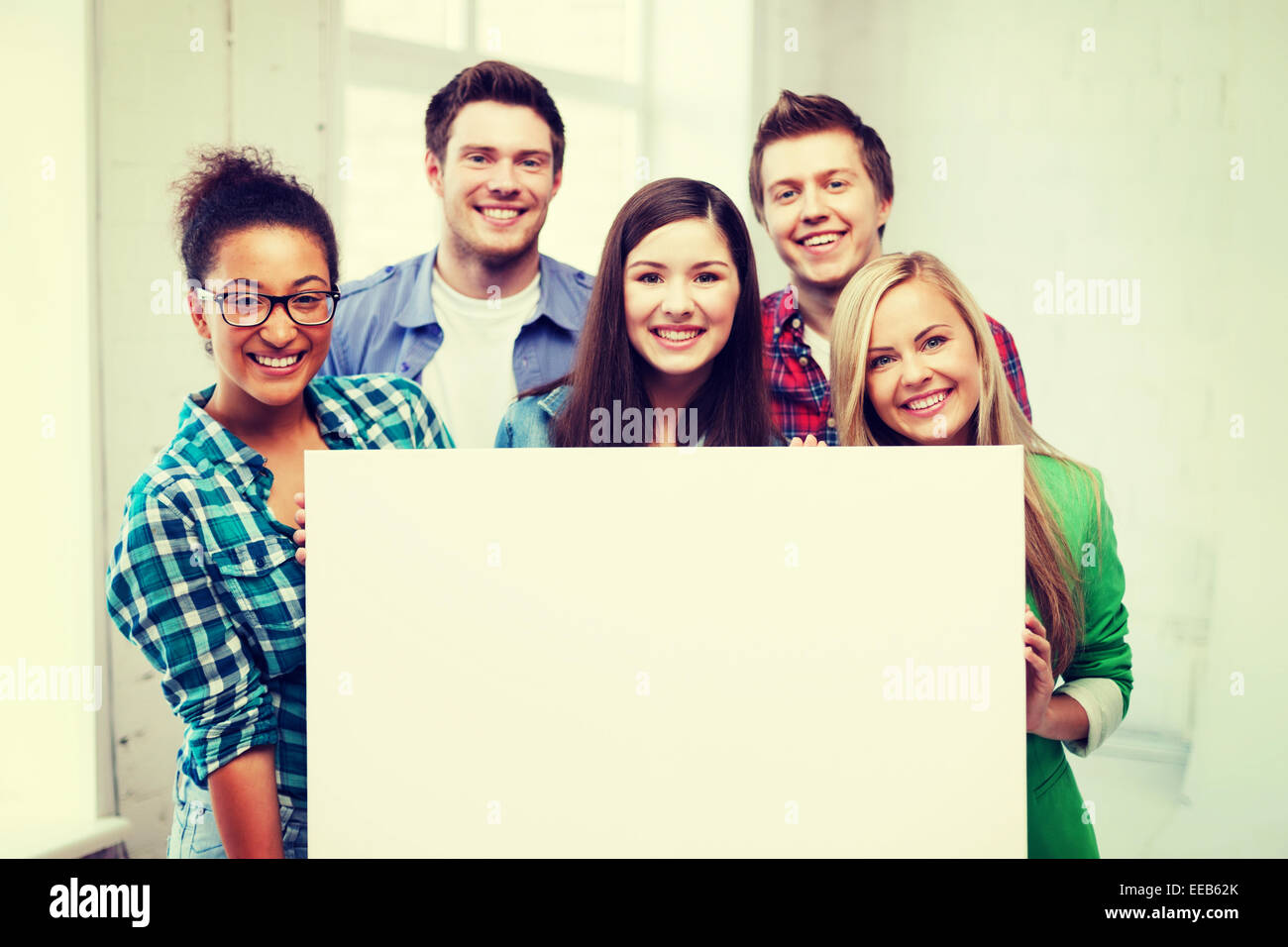 group of students at school with blank board Stock Photo - Alamy