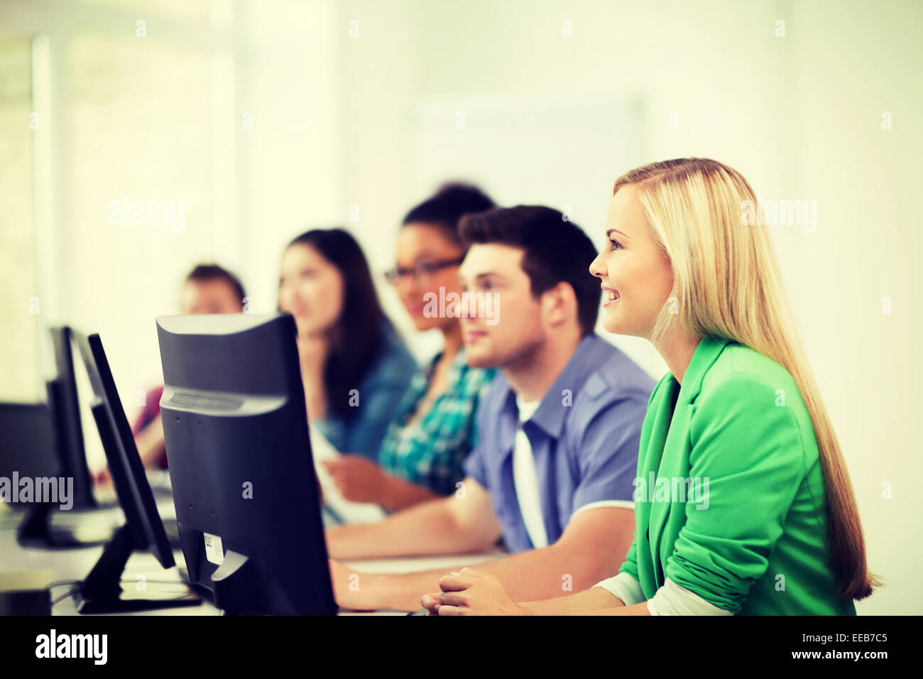 students with computers studying at school Stock Photo - Alamy