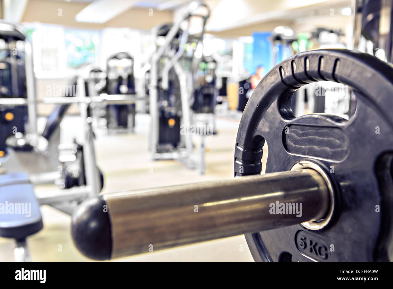 diverse equipment and machines at the gym room Stock Photo - Alamy