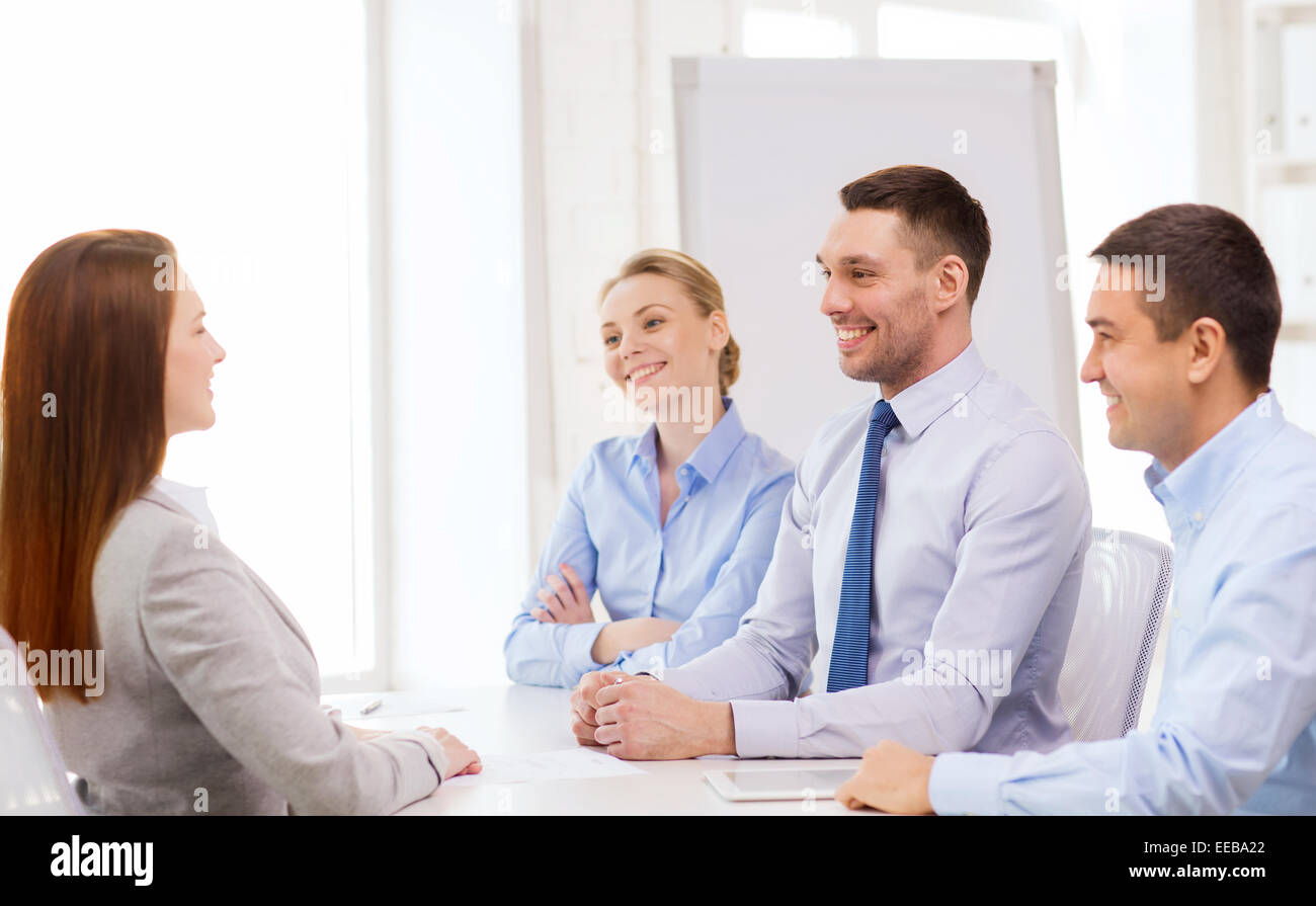 smiling businesswoman at interview in office Stock Photo - Alamy