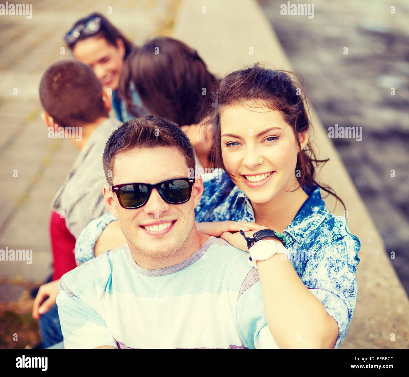 smiling teenagers in sunglasses having fun outside Stock Photo - Alamy