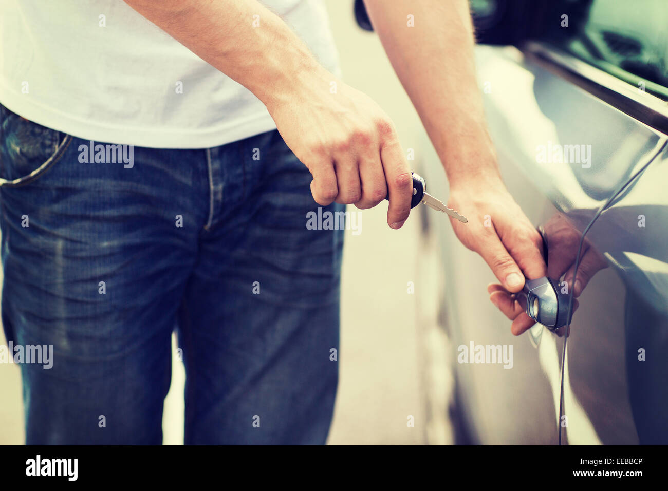 man with car key outside Stock Photo - Alamy