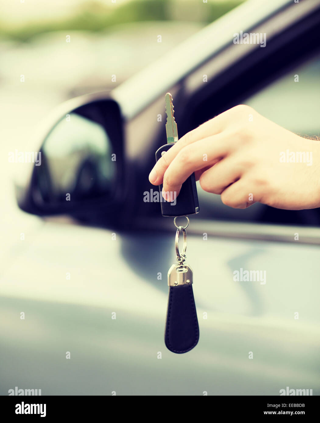 man with car key outside Stock Photo - Alamy