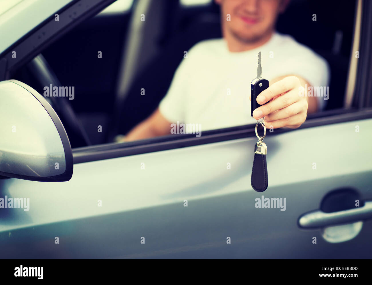 man with car key outside Stock Photo - Alamy
